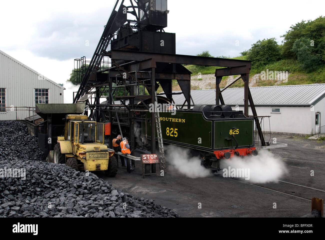 Steam locomotive letting off steam in the refuelling/decommissioning ...