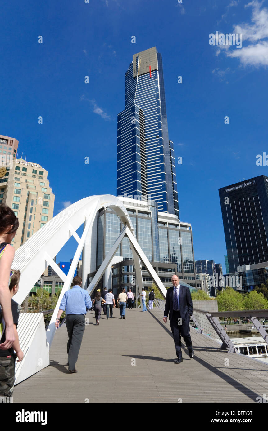 People crossing a pedestrian bridge Stock Photo - Alamy