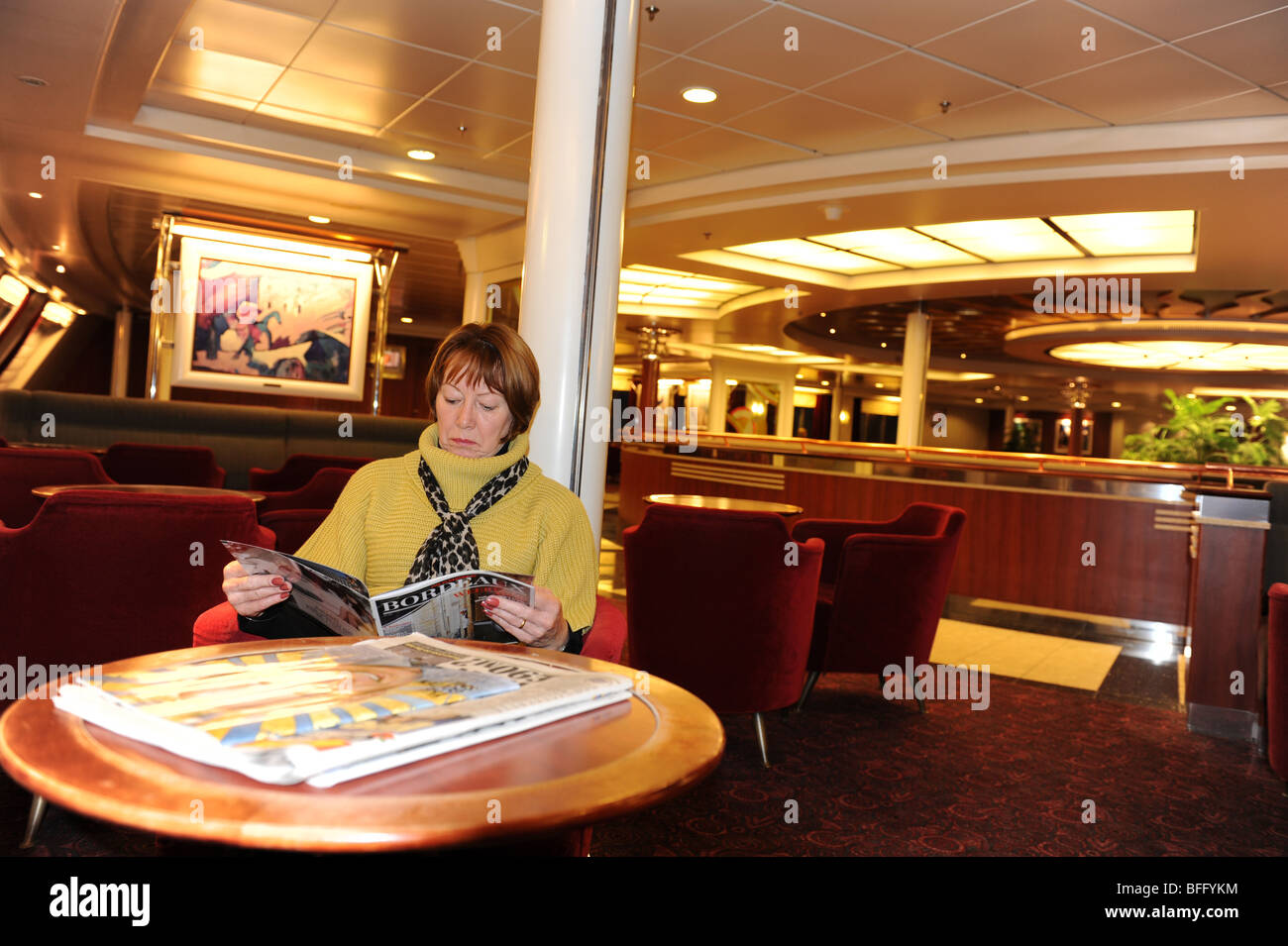 Female passenger reading a magazine on a Seafrance cross channel ferry ...