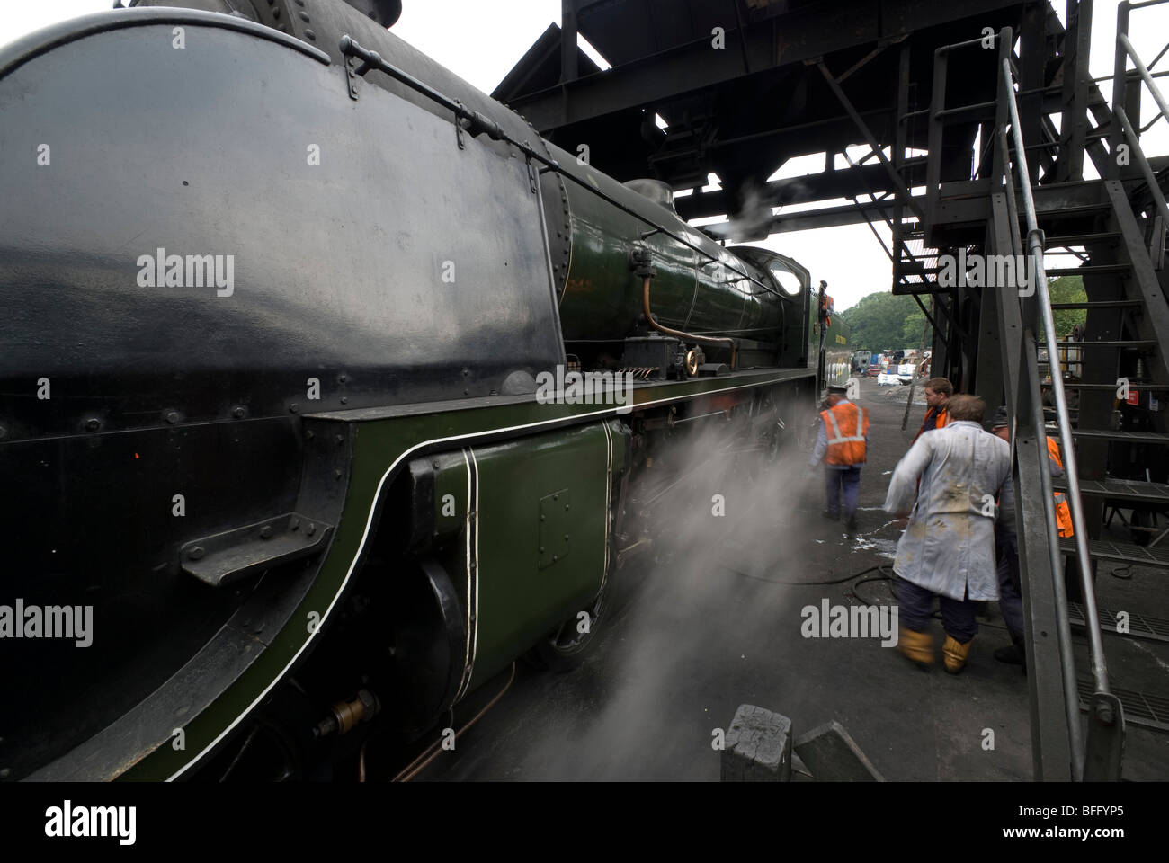 Steam locomotive letting off steam in the refuelling/decommissioning ...