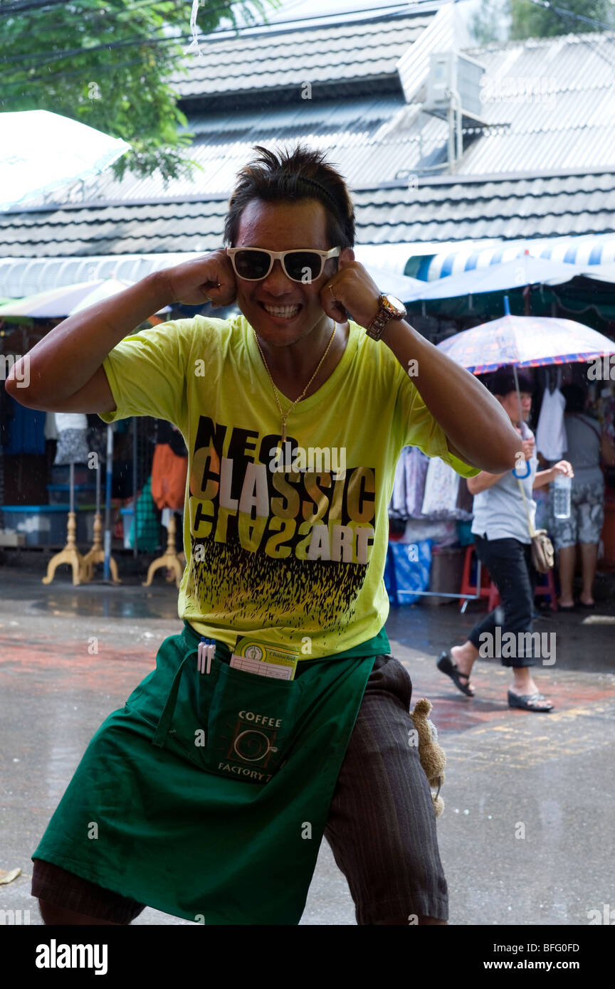 Crazy coffee waiter at chatuchak weekend market,Bangkok,Thailand Stock ...