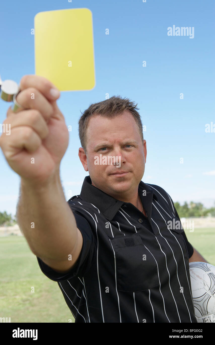 Soccer Referee Showing Yellow Card Stock Photo - Alamy