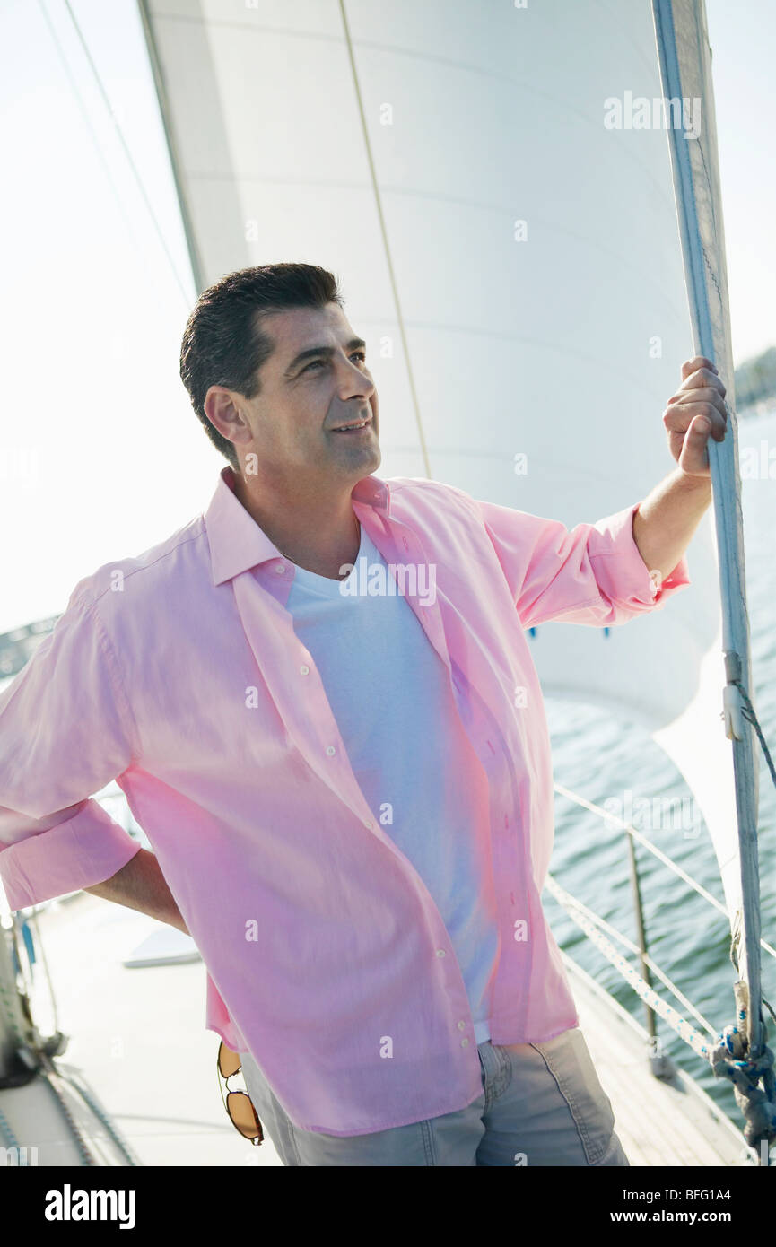 Man on Sailing Boat Stock Photo - Alamy