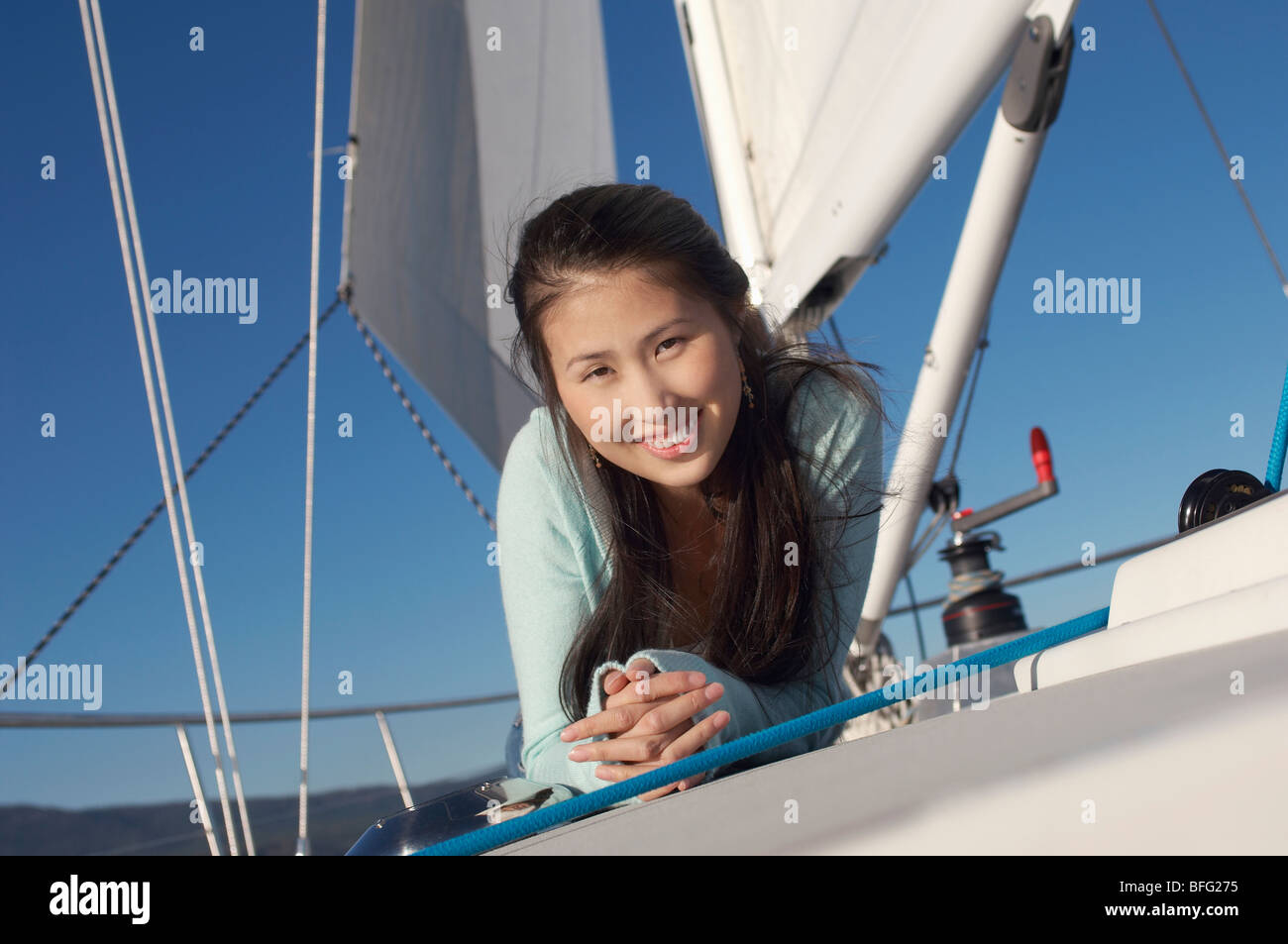Young woman on sailboat, (portrait Stock Photo - Alamy