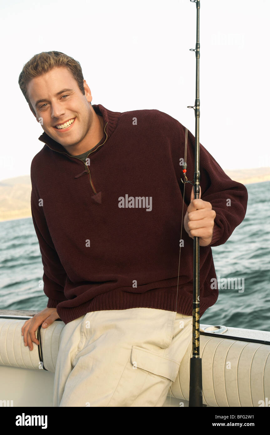Fisherman on boat, (portrait Stock Photo - Alamy