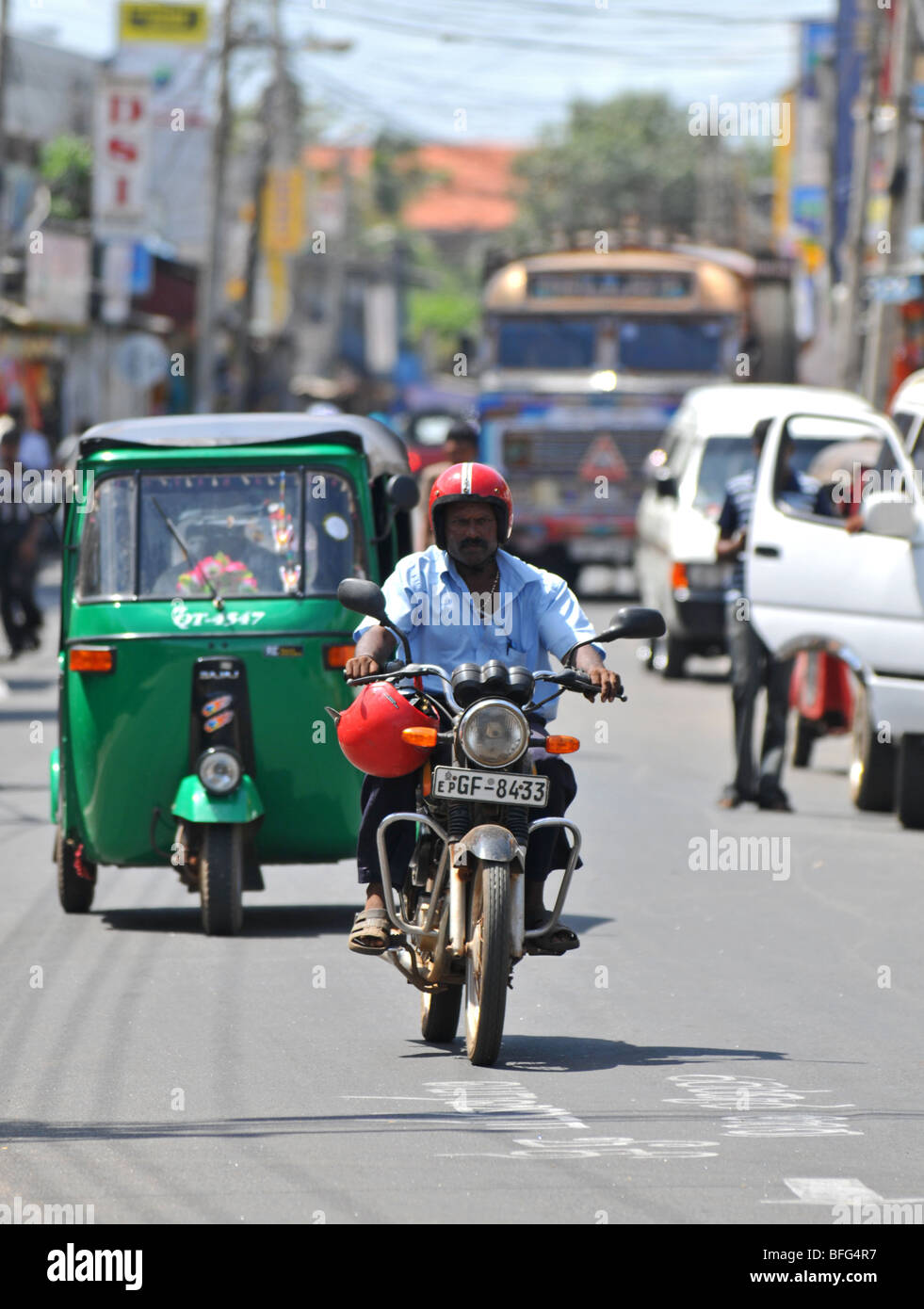 Trincomalee port city in north east Sri Lanka, street scene showing tuk ...