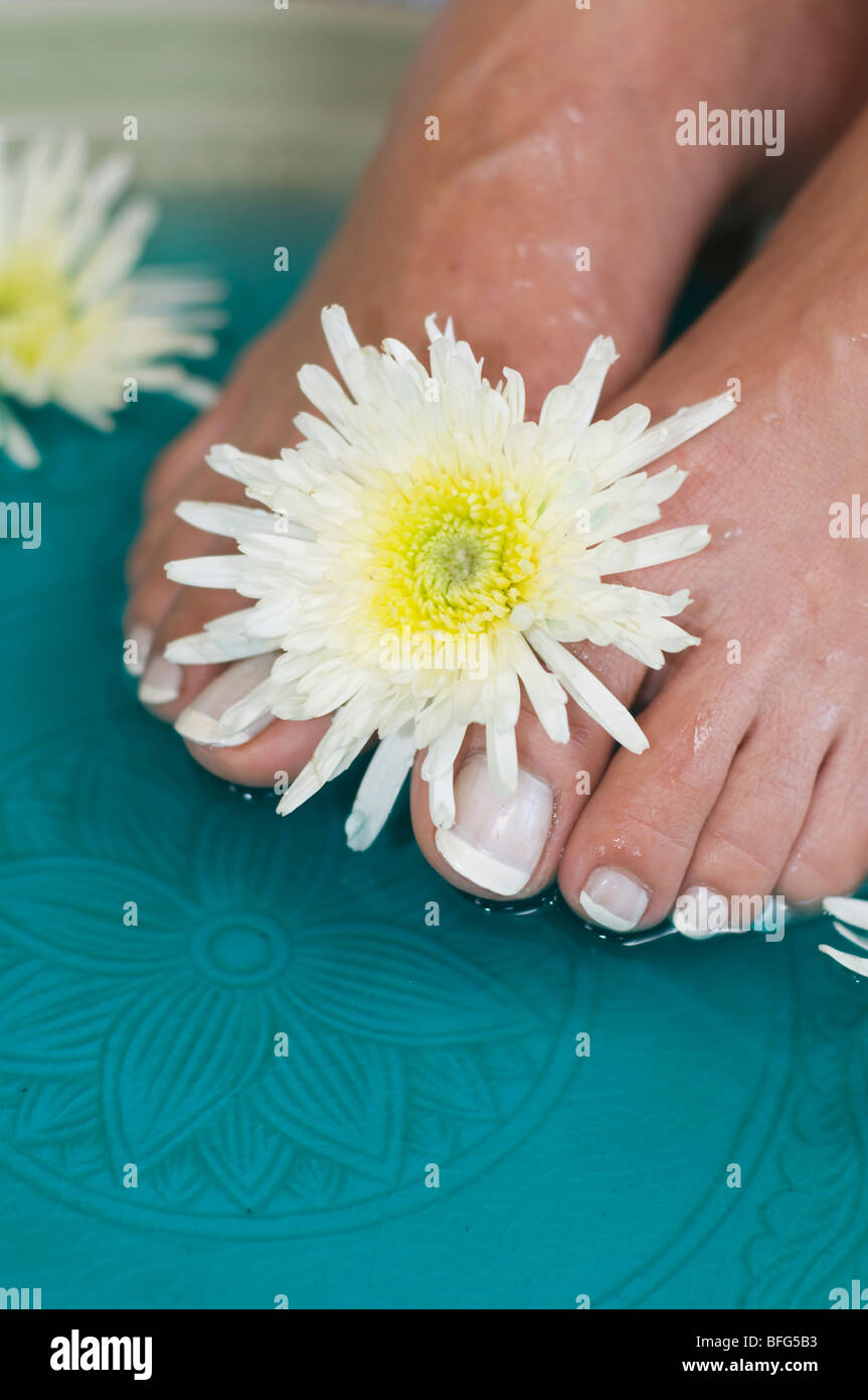 feet relaxing at health spa Stock Photo - Alamy