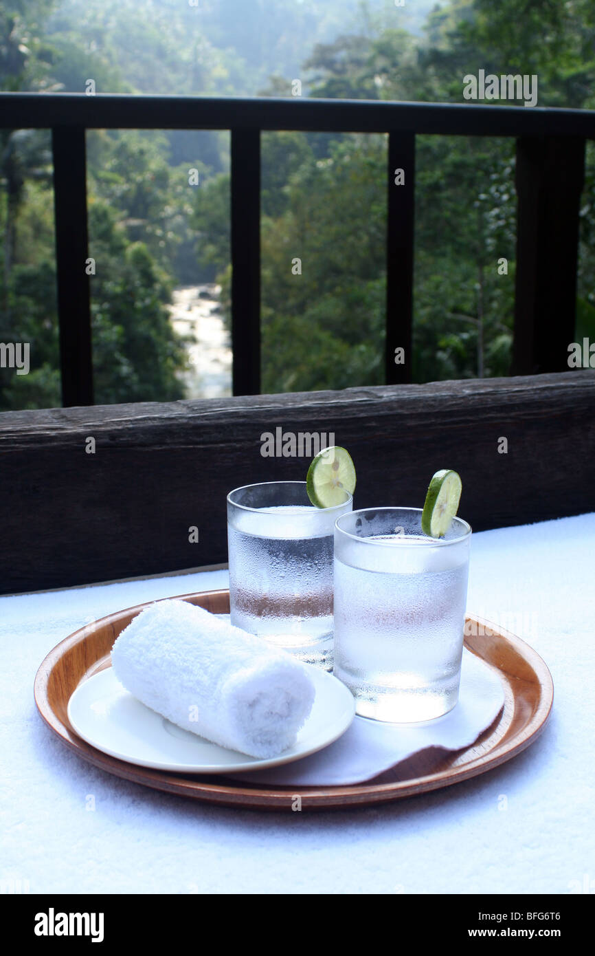 Flannel and water glasses with a river in the distance at a spa resort ...