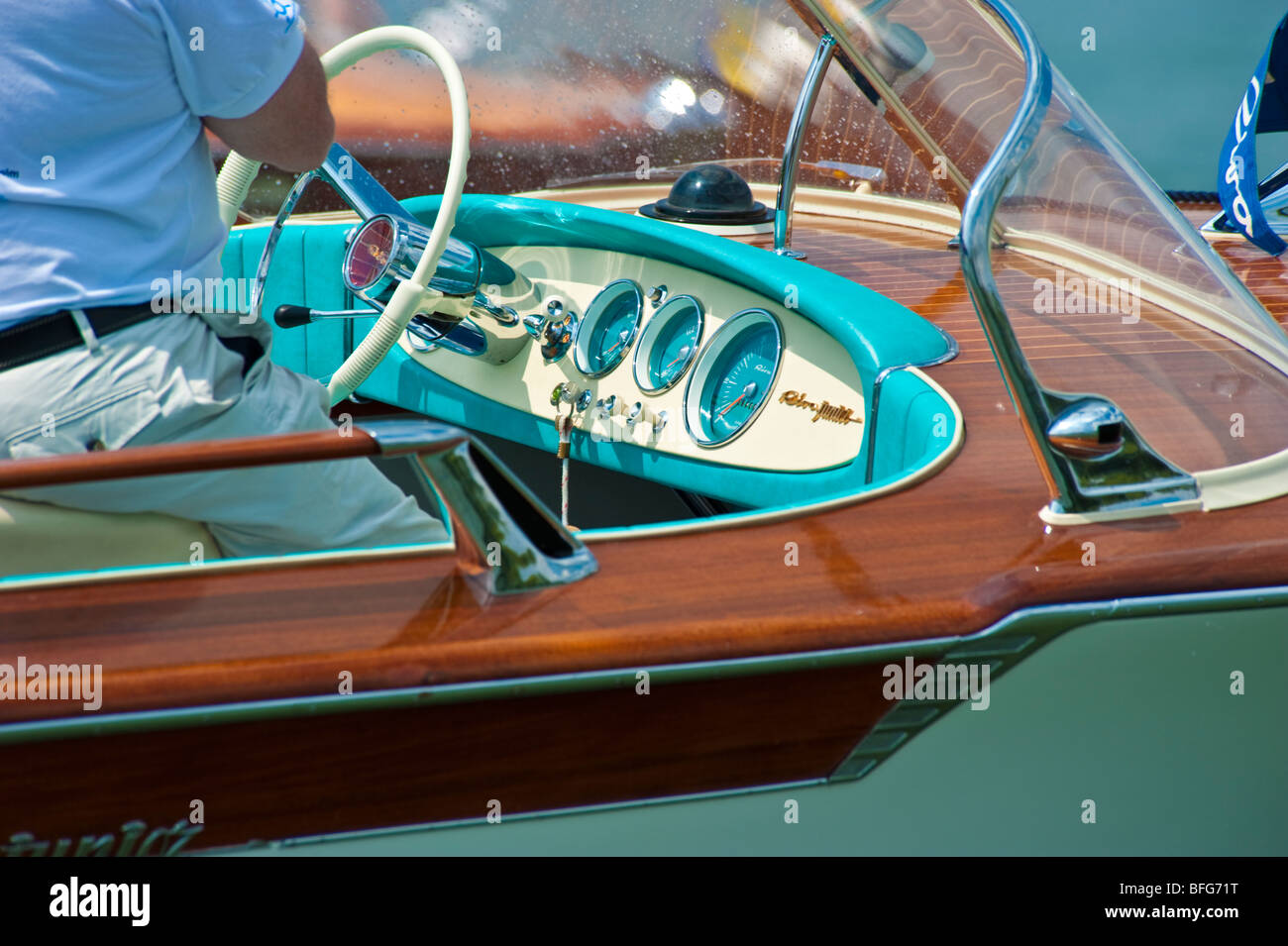 Cockpit with helm of classical power boat Riva Junior Stock Photo - Alamy