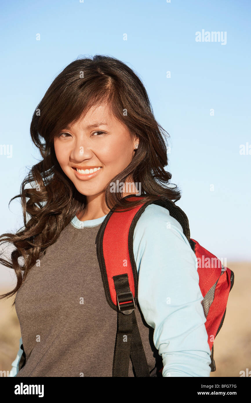 Young Woman wearing Backpack, portrait Stock Photo - Alamy