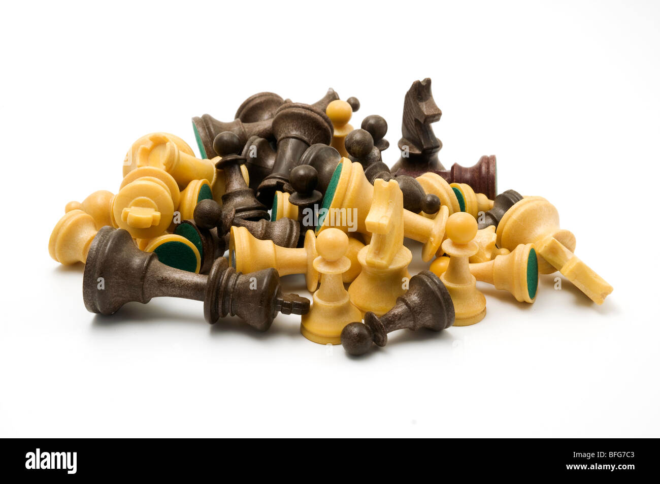 Scattered chess pieces on white background Stock Photo - Alamy