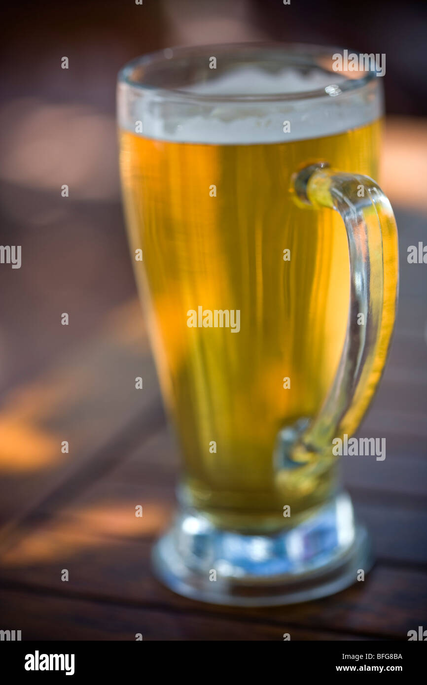 intentionally blurred pint of beer indicating drunk Stock Photo - Alamy