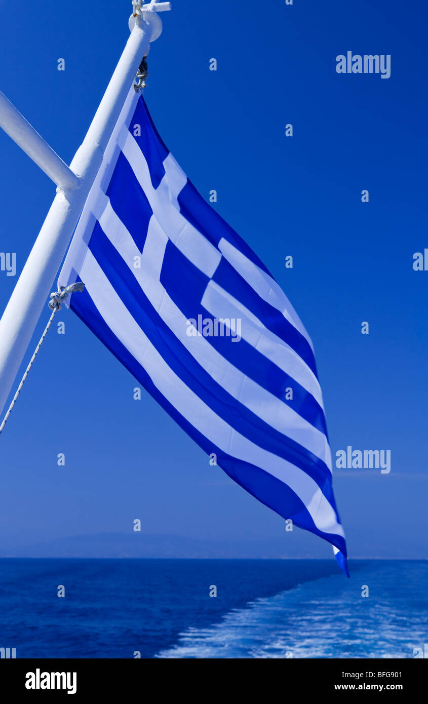 Close up view of the Greek national flag flying from the back of a boat ...