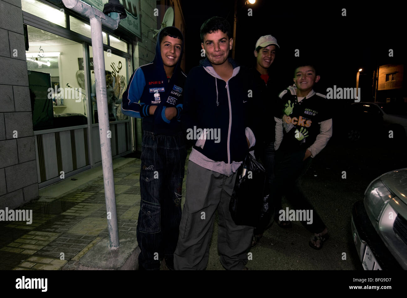 A group of Jordanian kids smile at the camera in the village of Dana ...
