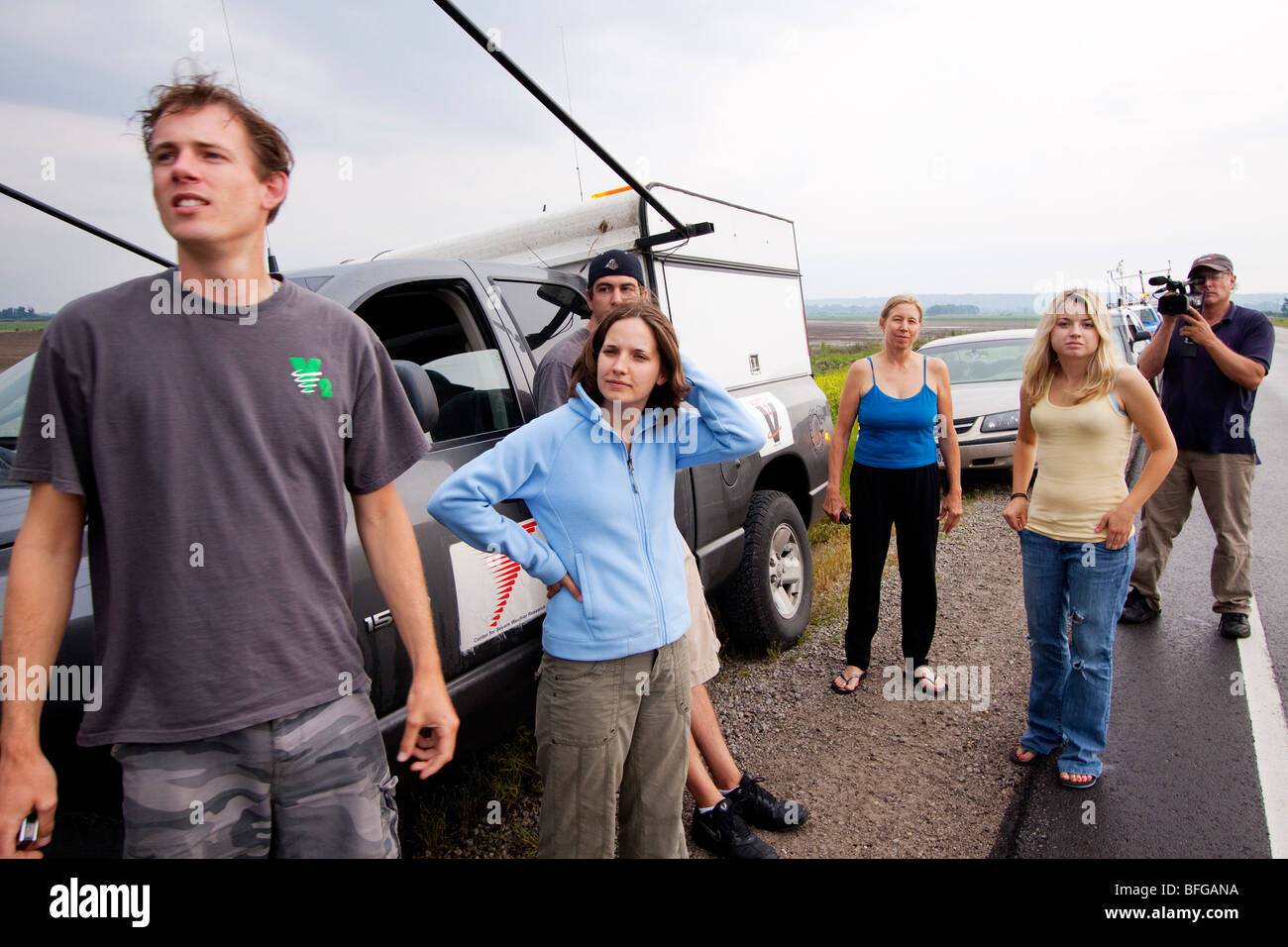 Storm chasers participating in Project Vortex 2 watch a developing ...