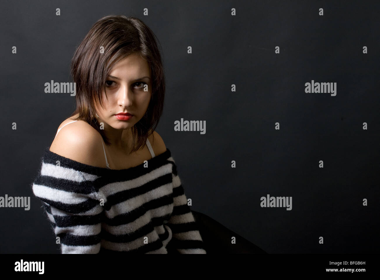 young girl low-key studio shot Stock Photo - Alamy