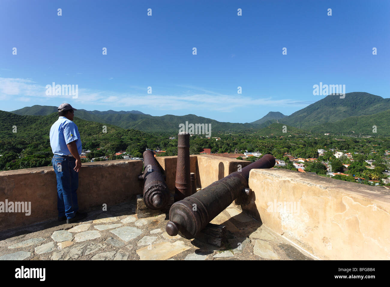 Man visiting Castillo de Santa Rosa, La Asuncion, Isla Margarita, Nueva ...