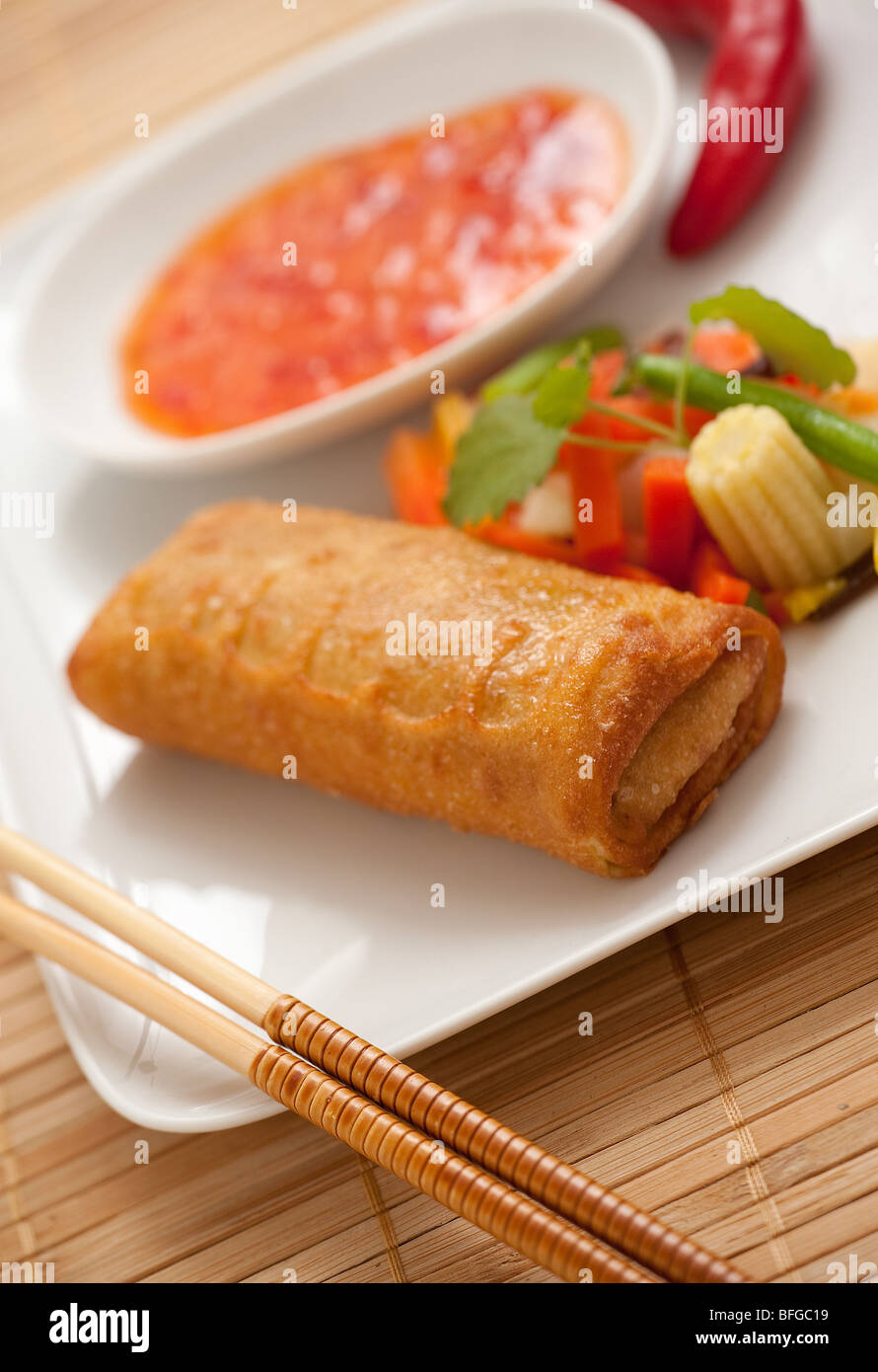 an asian spring roll and fresh vegetables Stock Photo - Alamy