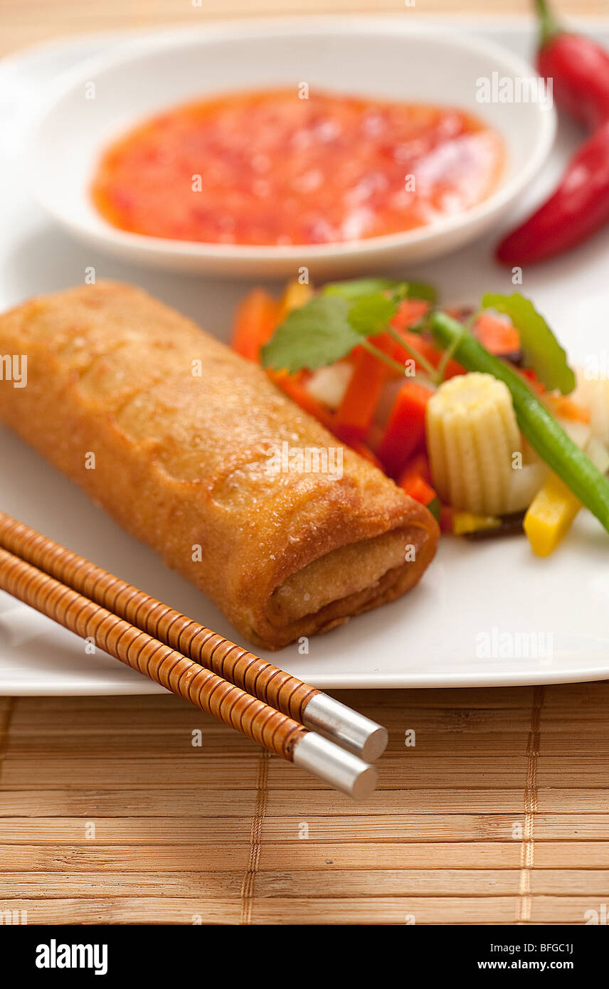 an asian spring roll and fresh vegetables Stock Photo - Alamy