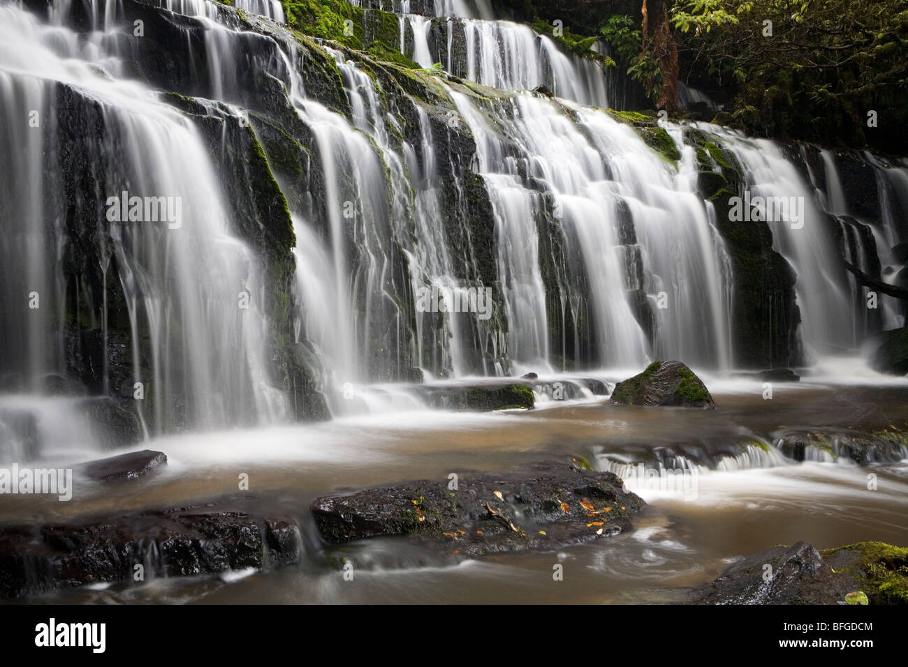 A popular stop in the Owaka area is Purakaunui Falls, Catlins, New ...