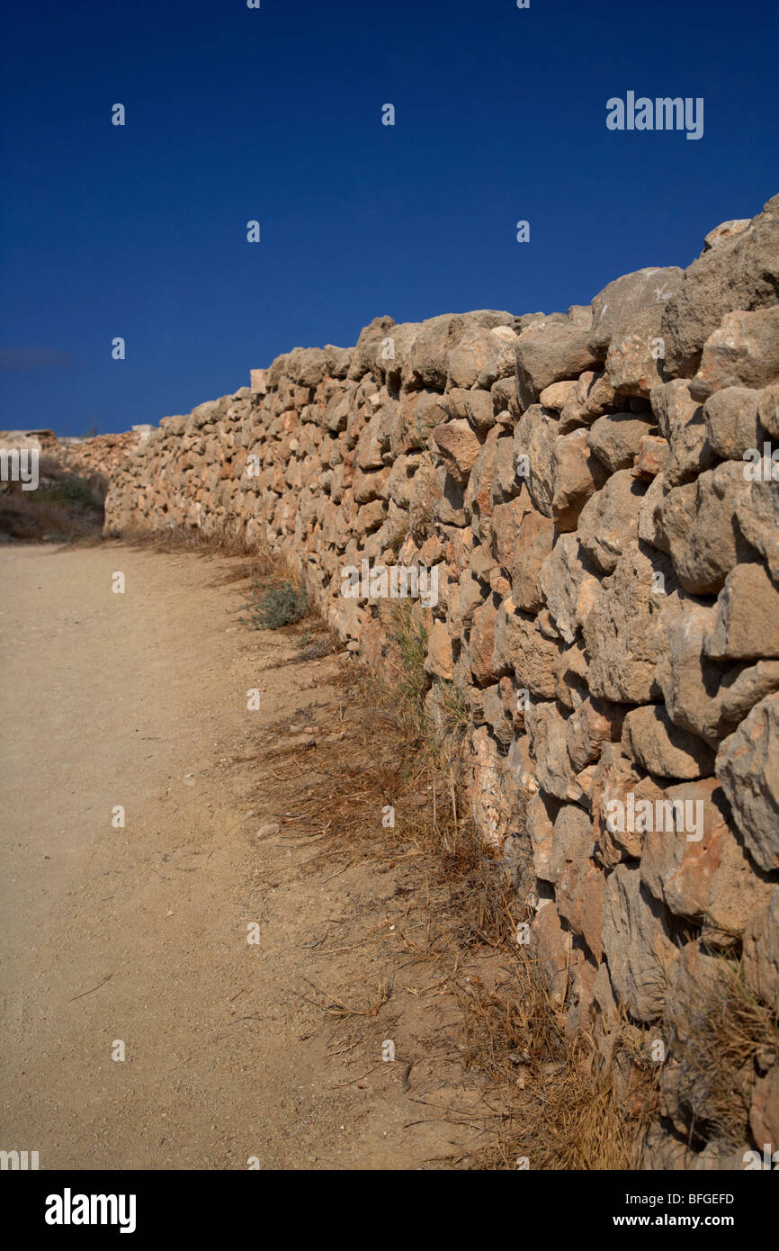 old ancient town wall at the unesco archeological park in paphos ...