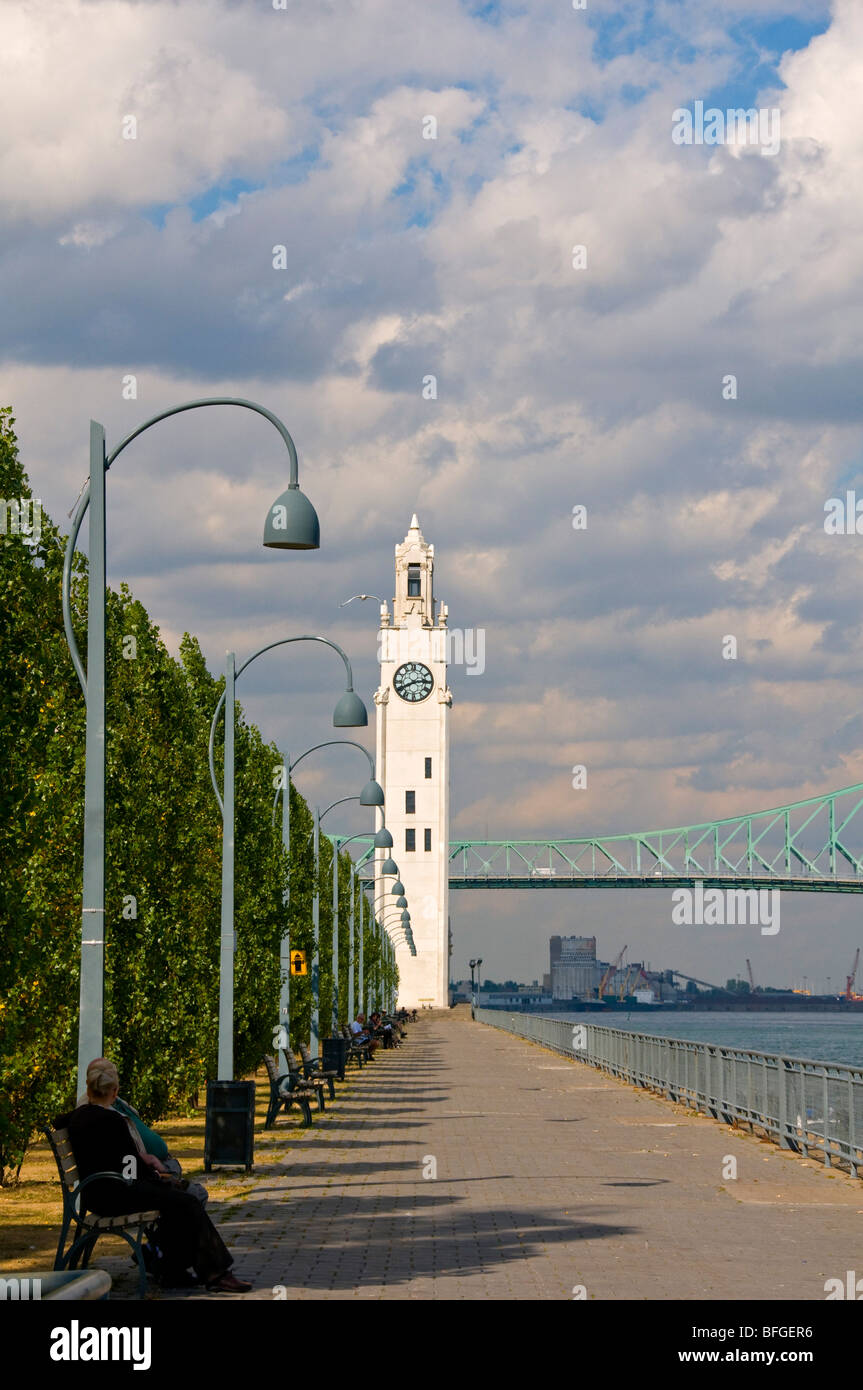Old Port of Montreal Clock tower and Jacques Cartier Bridge Stock Photo ...