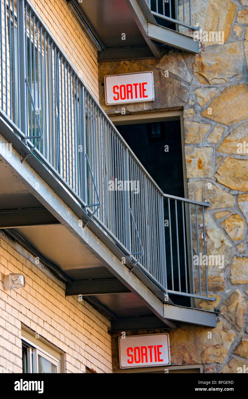 Balconies with word exit in French Stock Photo - Alamy