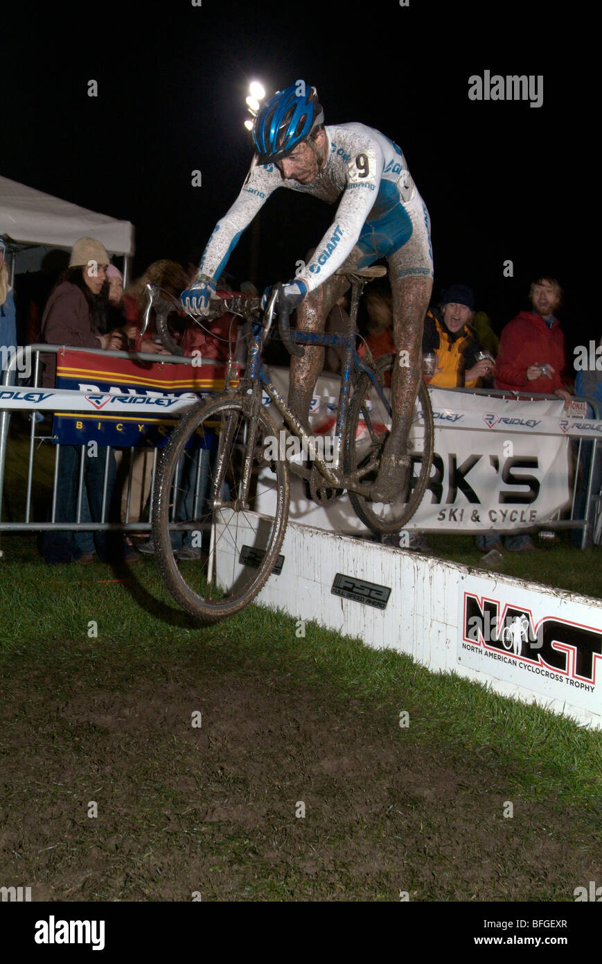 Cyclocross racer Adam Craig bunny hopping the barriers Stock Photo - Alamy