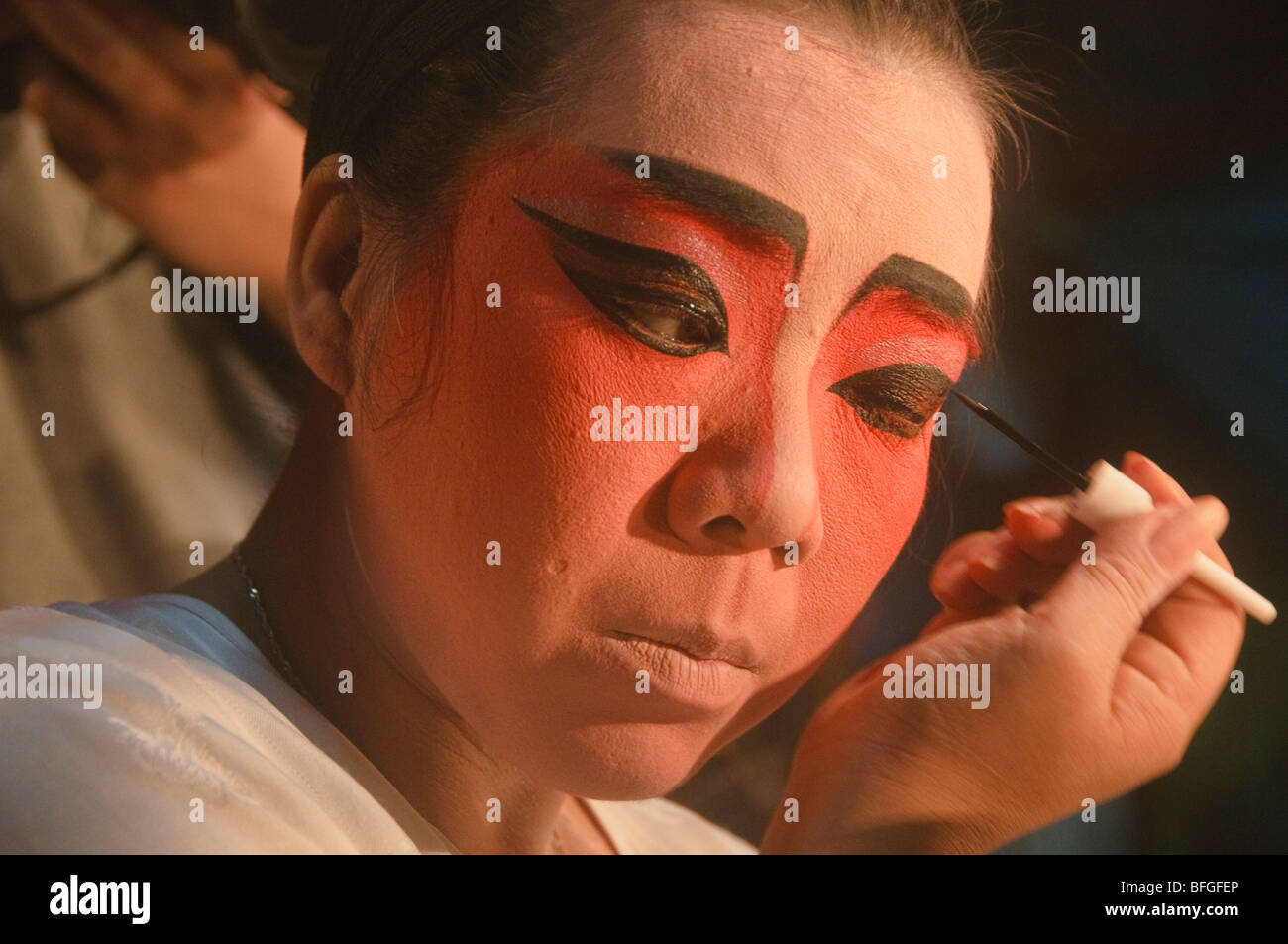 Chinese opera performer gets ready backstage in Bangkok Thailand Stock ...