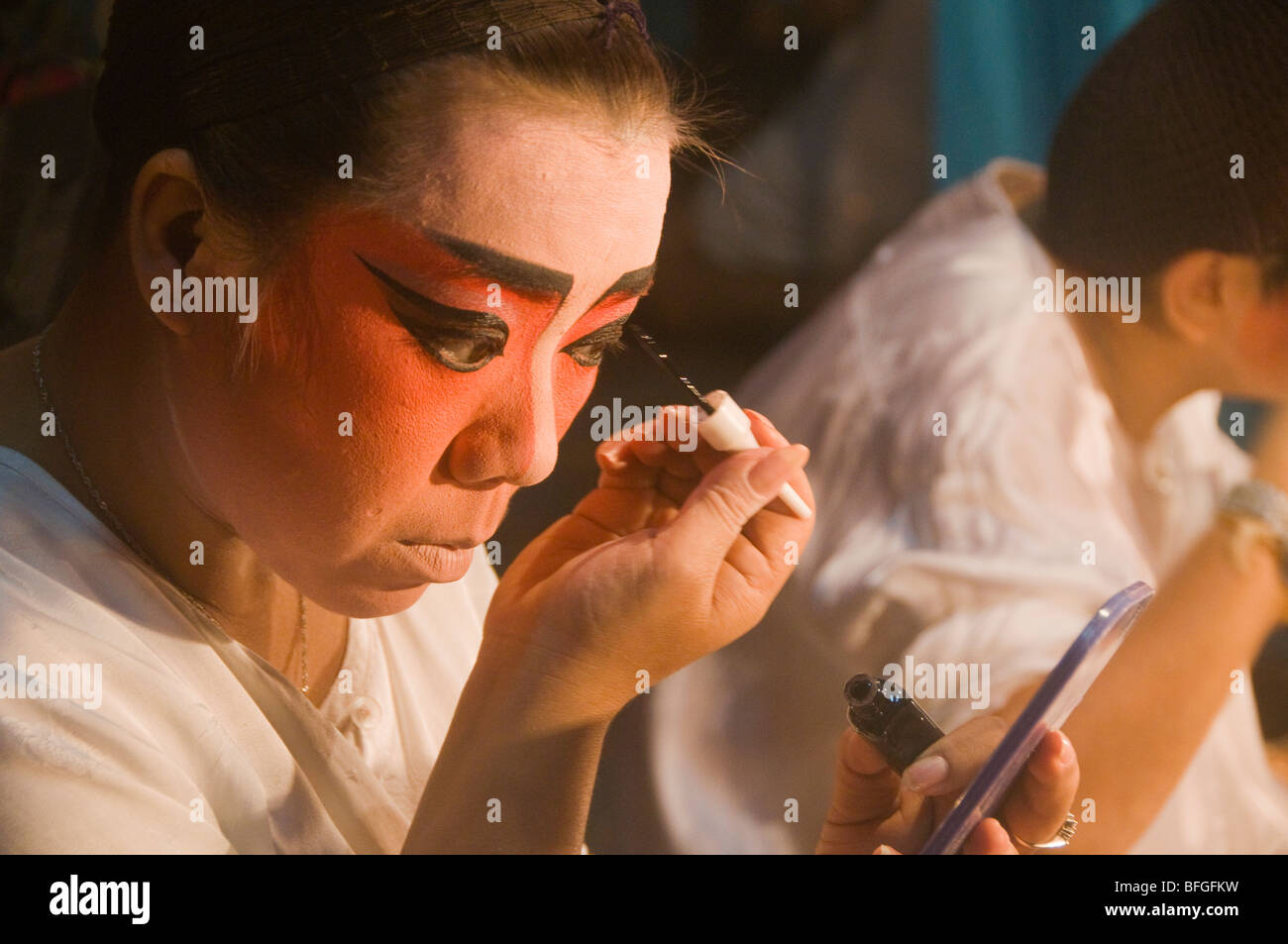 Chinese opera performer gets ready backstage in Bangkok Thailand Stock ...