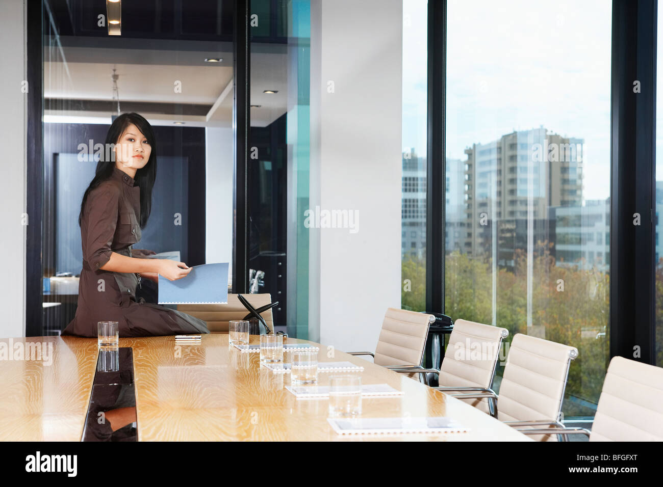 Businesswoman in Conference Room Stock Photo - Alamy