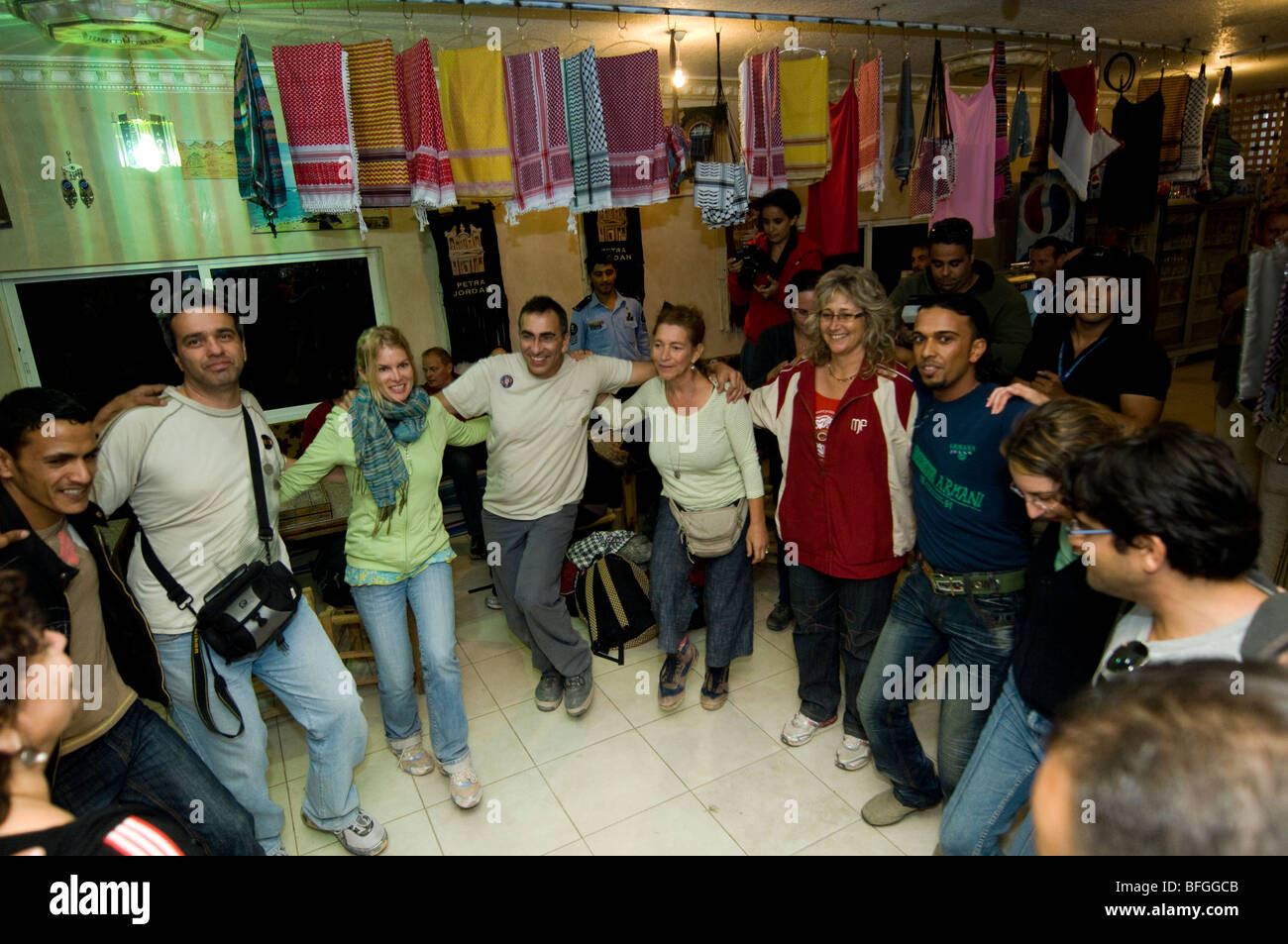 A spontaneous party involving locals and tourists in a roadside café ...
