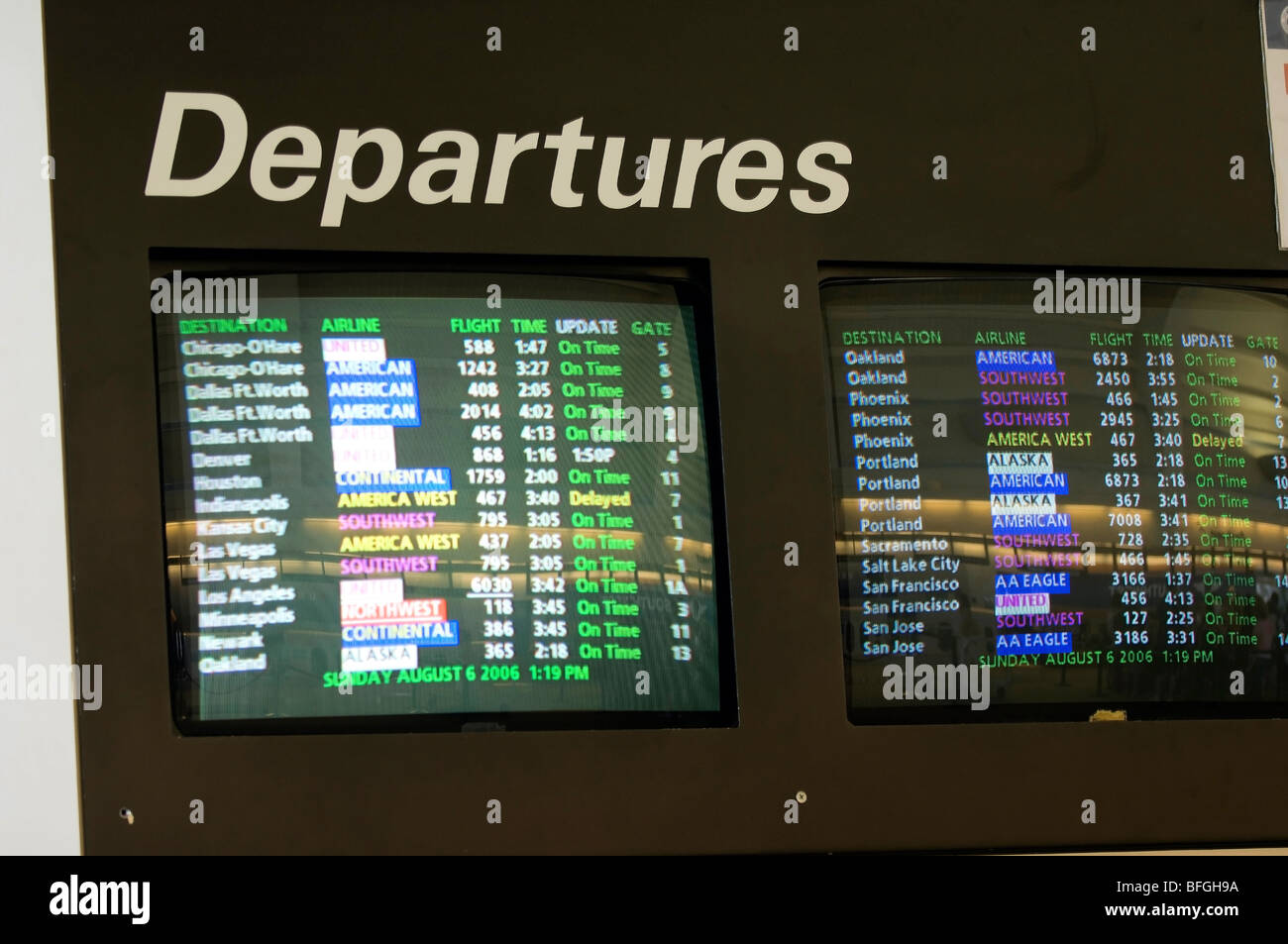 Airport departure information monitors Stock Photo - Alamy