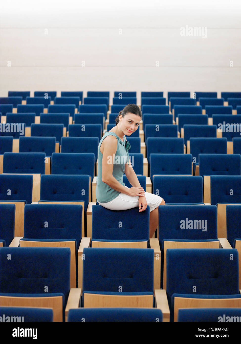 Man sitting alone in auditorium hi-res stock photography and images - Alamy