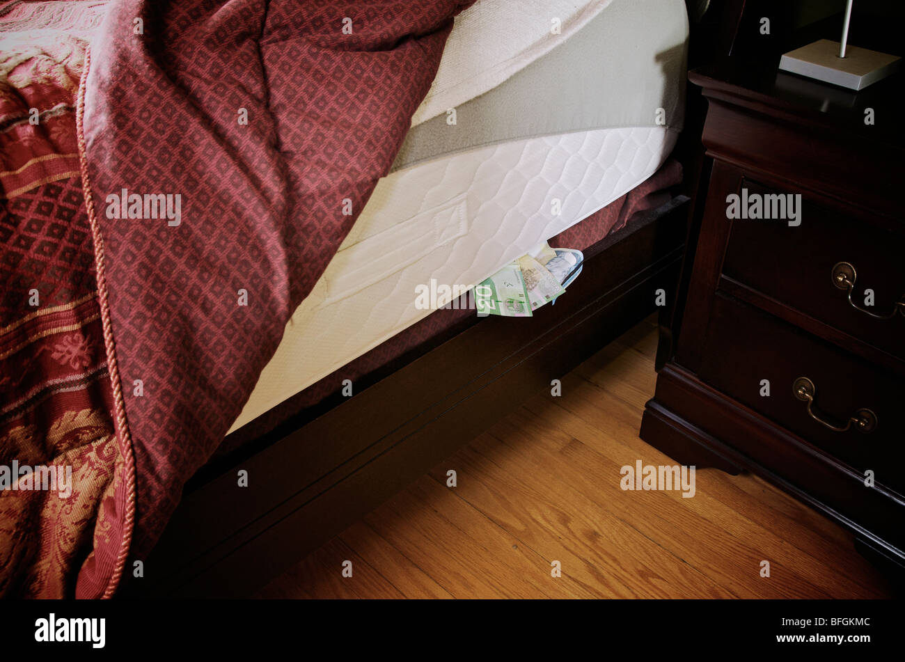 Money under mattress hi-res stock photography and images - Alamy