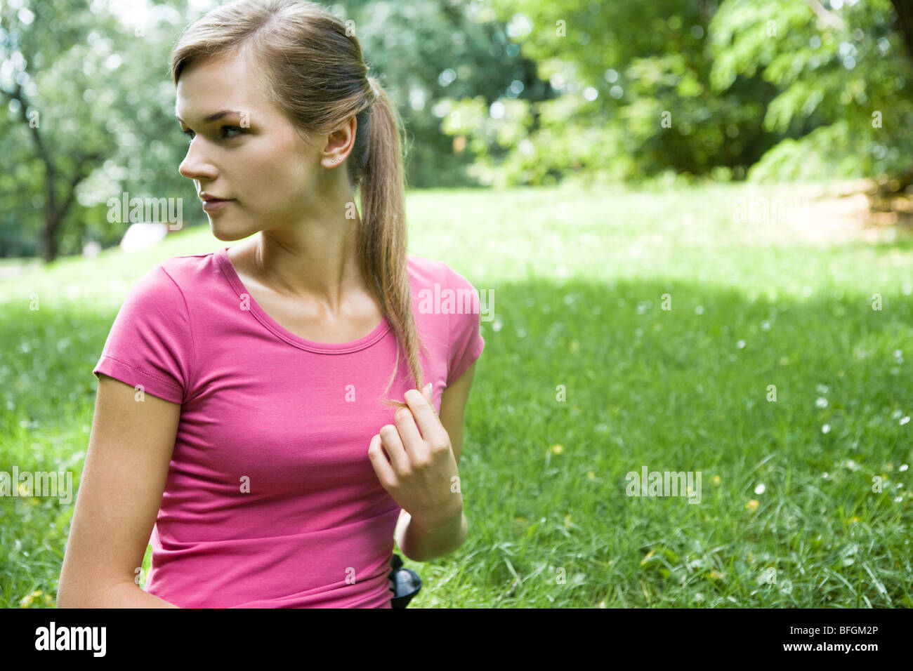 young woman looking left Stock Photo - Alamy