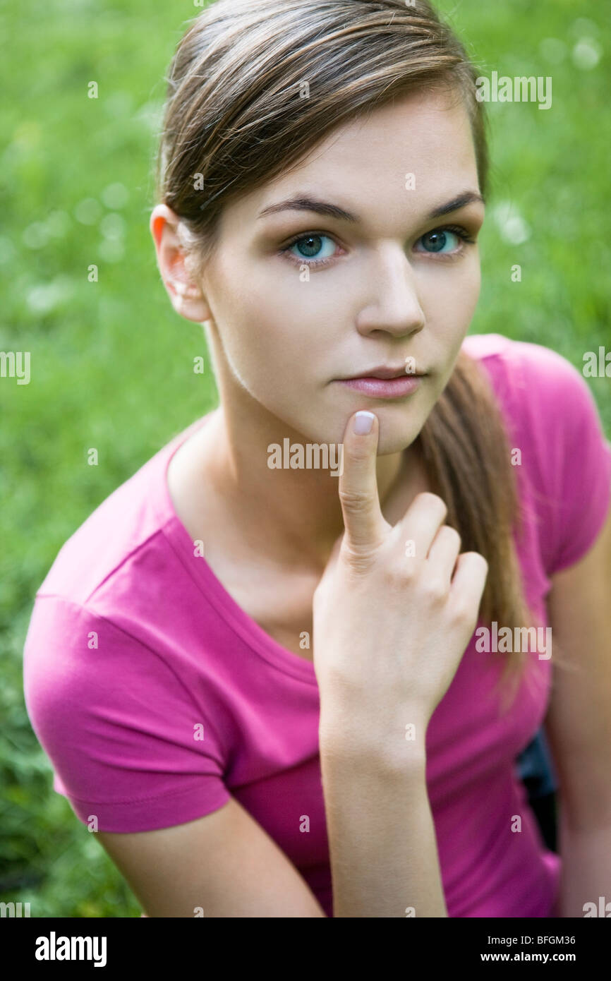 young woman thinking Stock Photo - Alamy