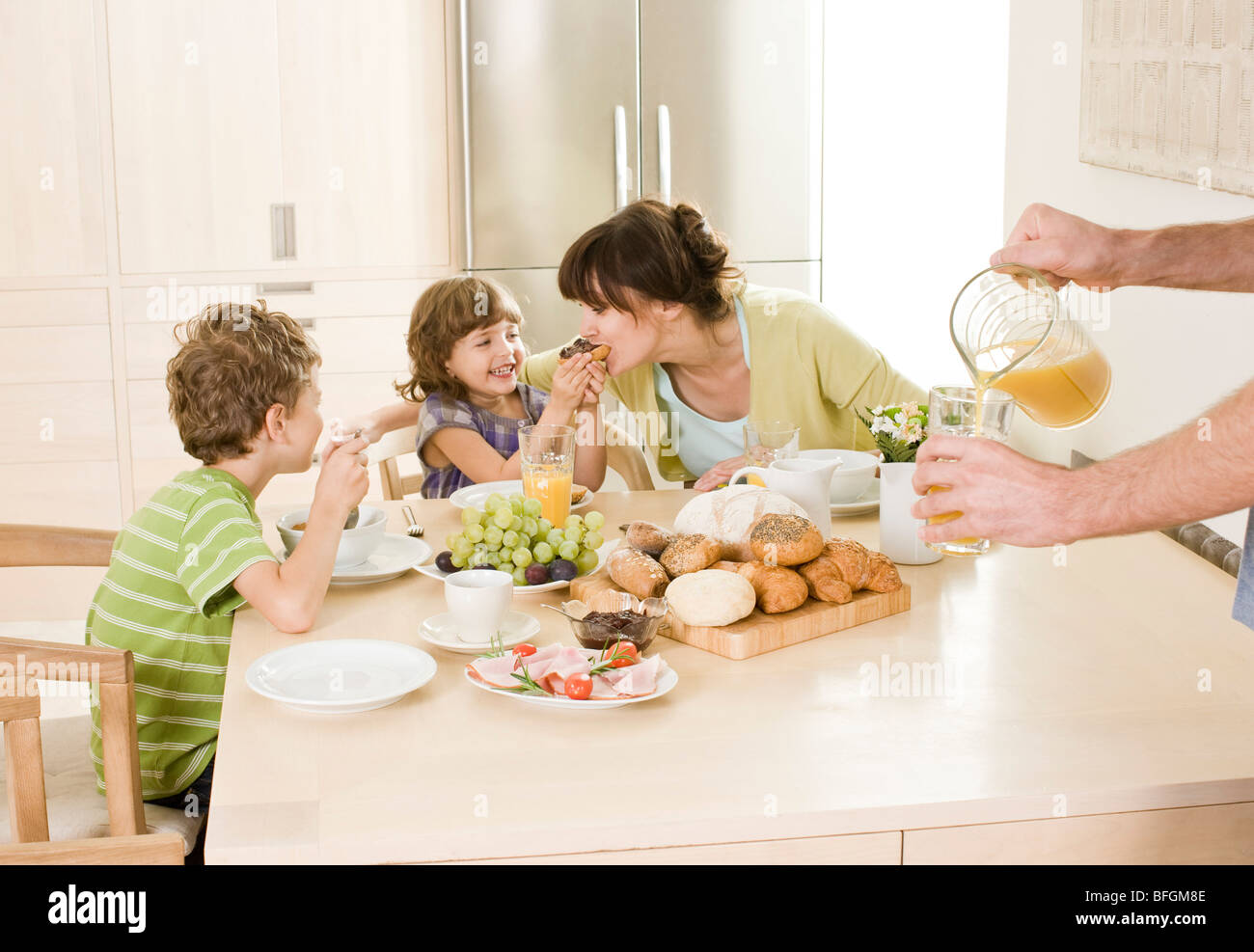 family eating breakfast Stock Photo - Alamy