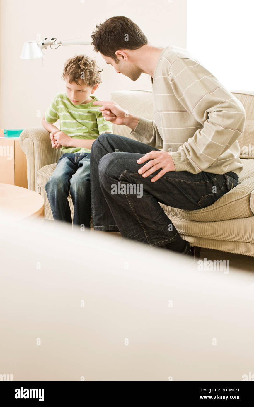 father talking seriously with son Stock Photo - Alamy