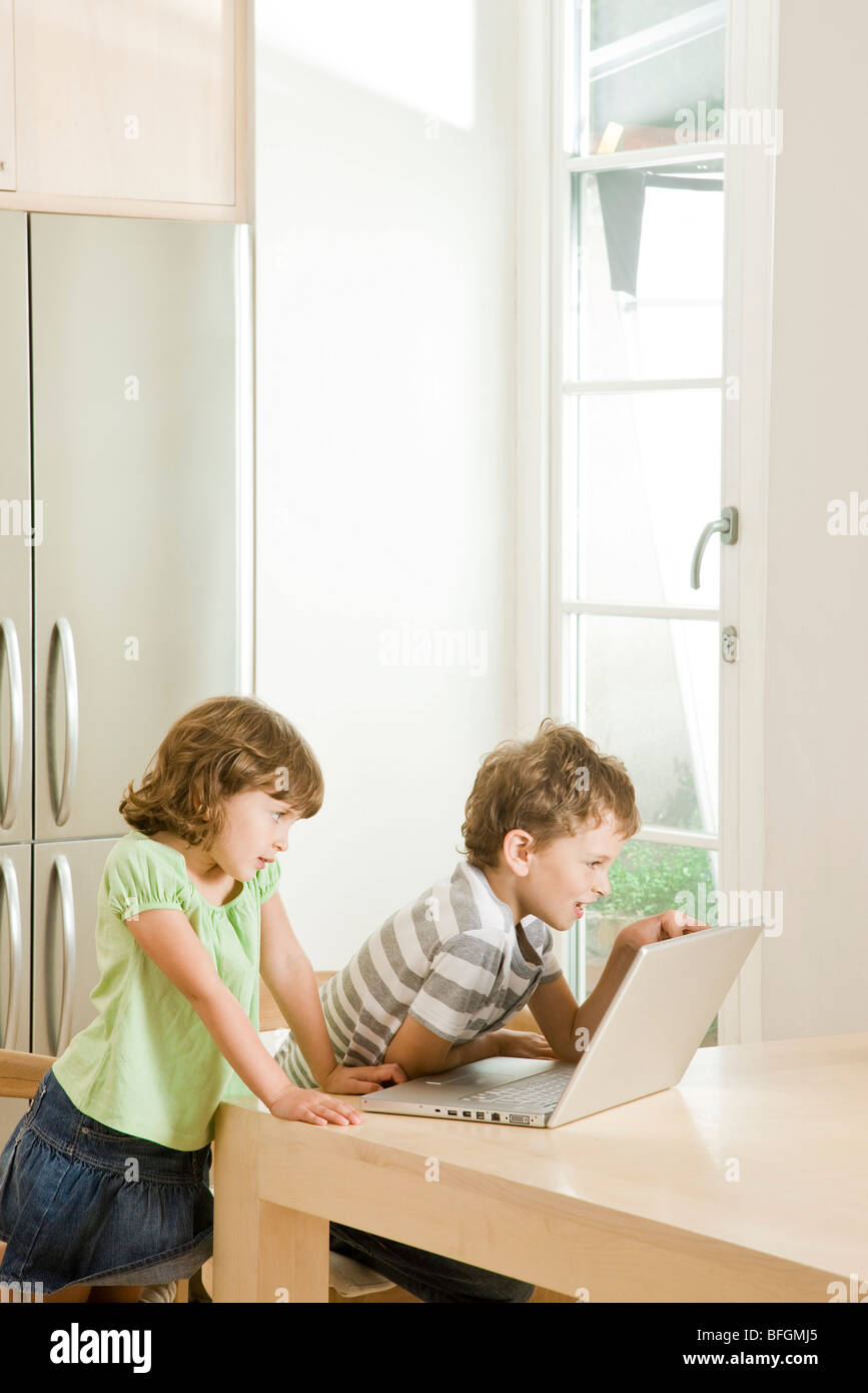 children using laptop Stock Photo - Alamy