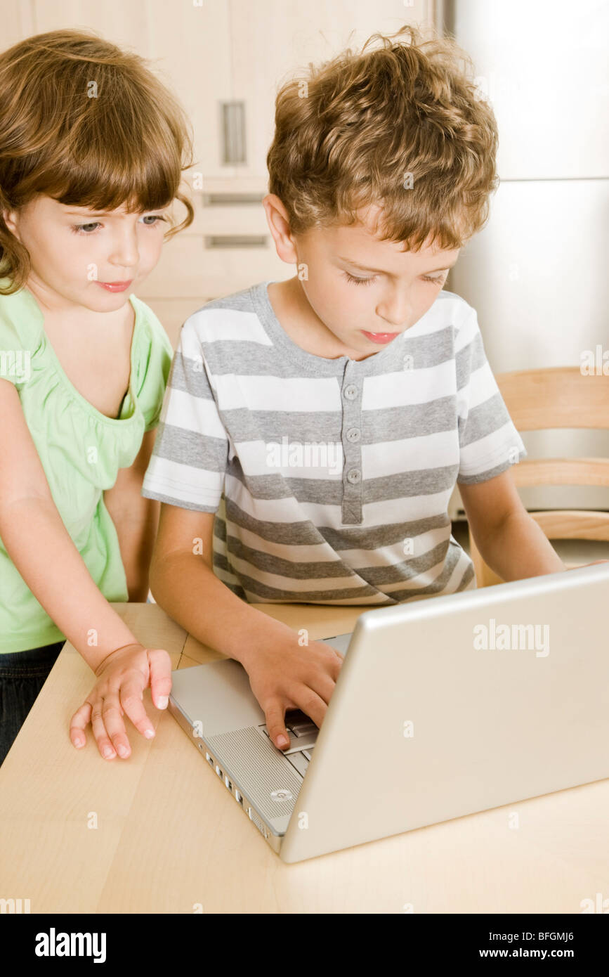children using laptop Stock Photo - Alamy