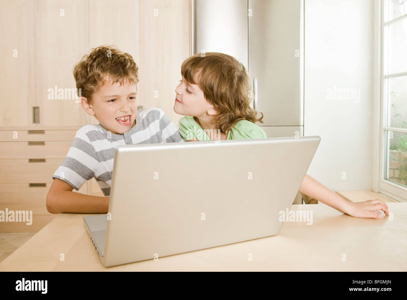 children using laptop Stock Photo - Alamy