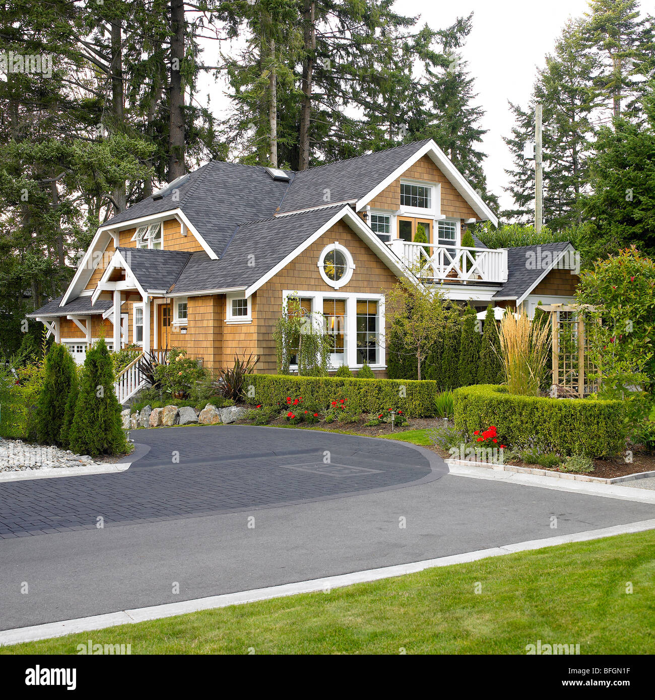 Exterior of cape cod style home with woods in the background, Victoria ...