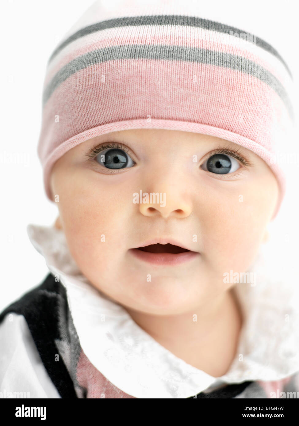 Portrait of baby girl in toque Stock Photo - Alamy