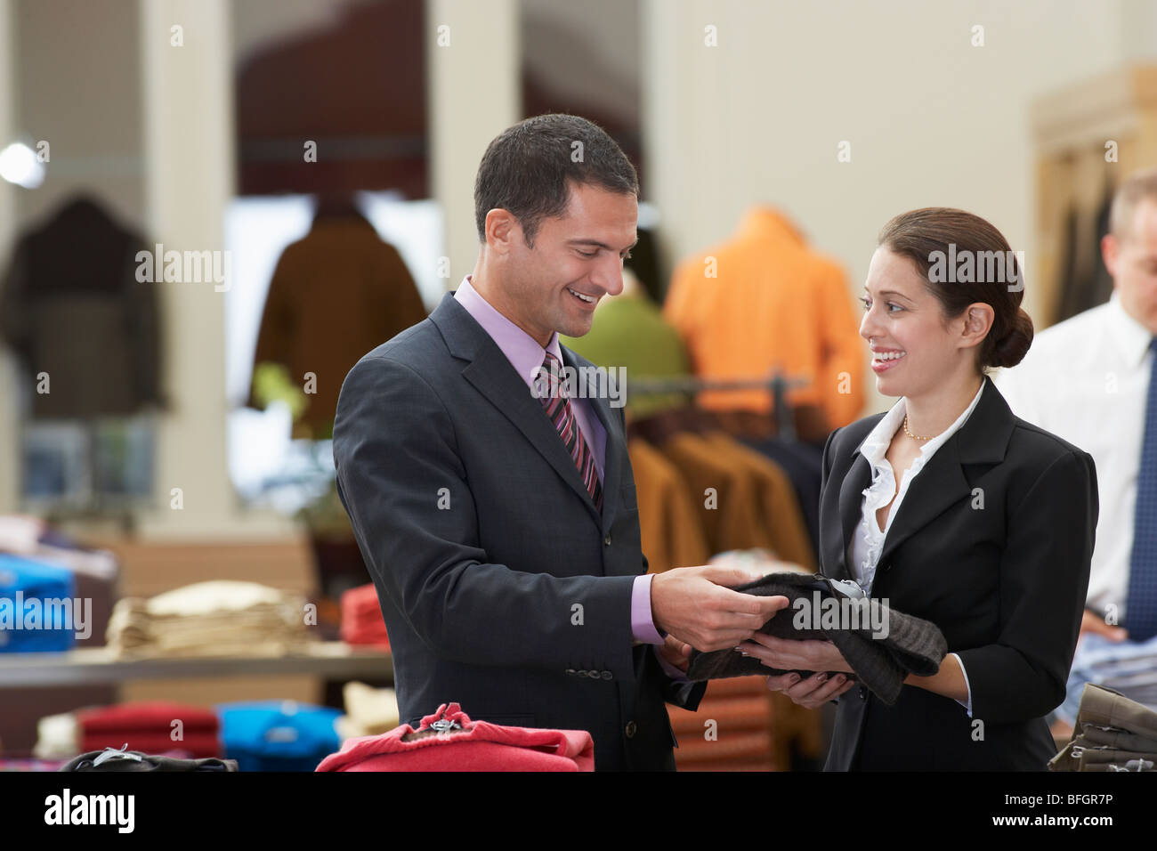 Man in Clothing Store Stock Photo - Alamy
