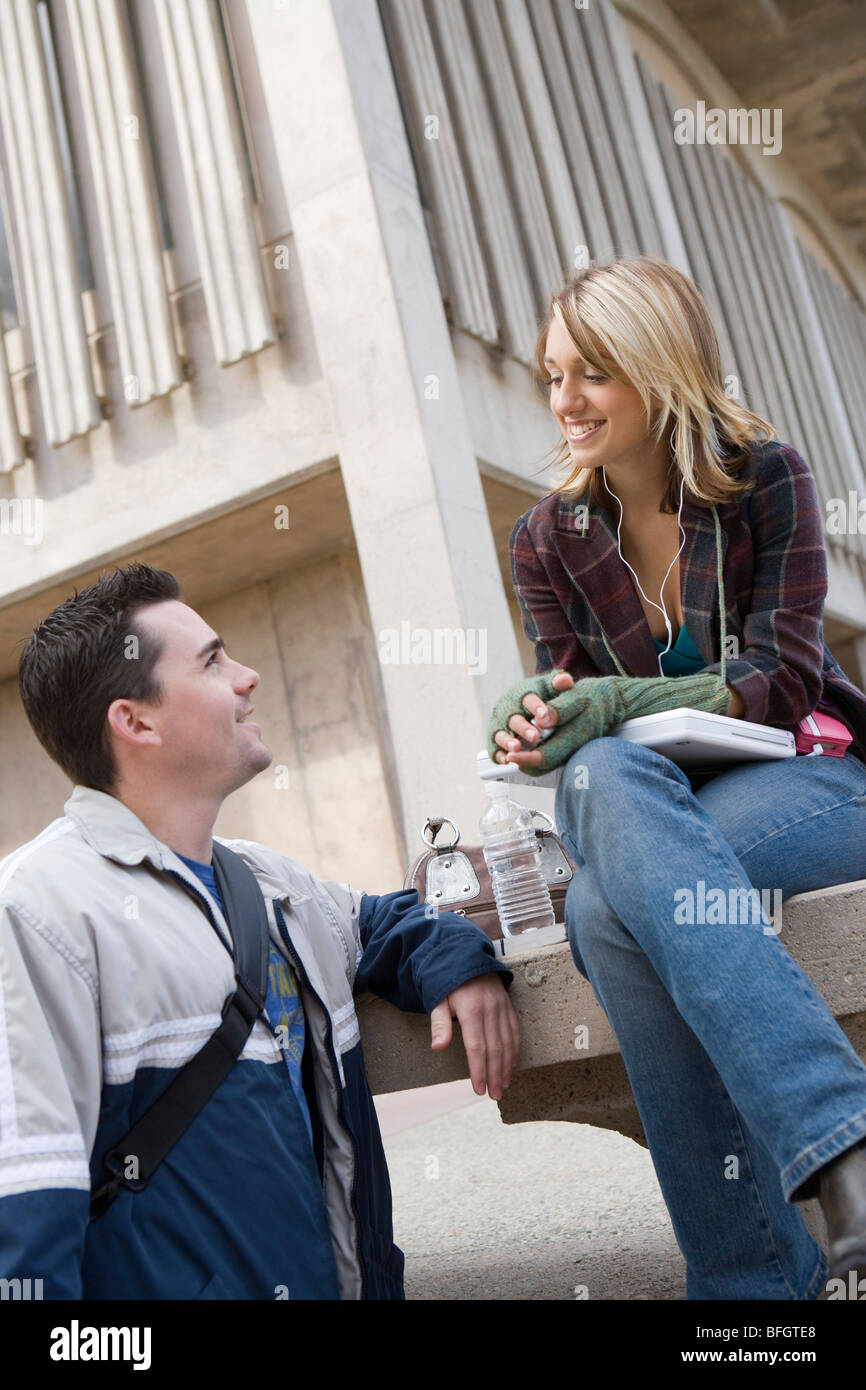 Young boy and girl flirting Stock Photo - Alamy
