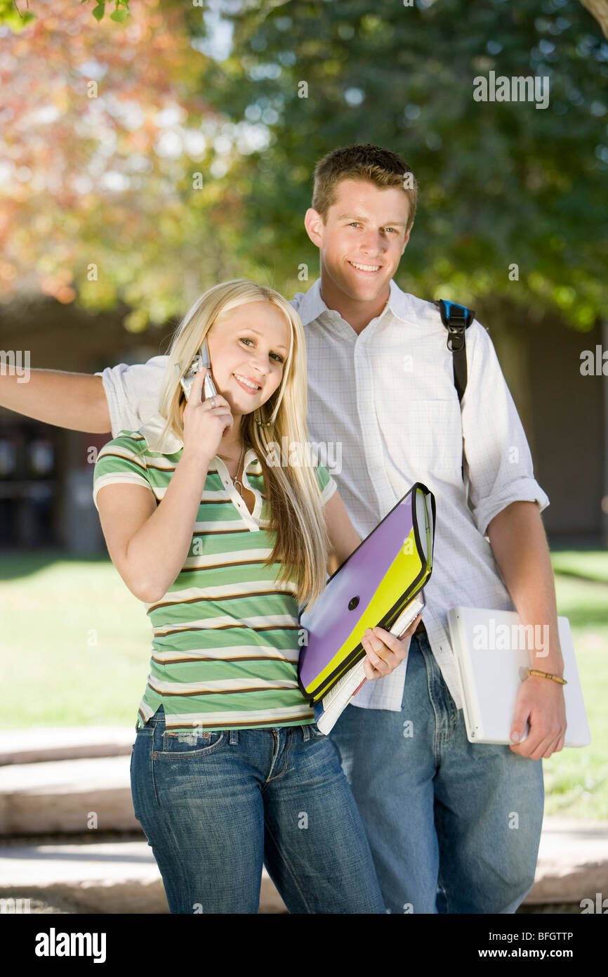 Two young students looking at camera Stock Photo - Alamy