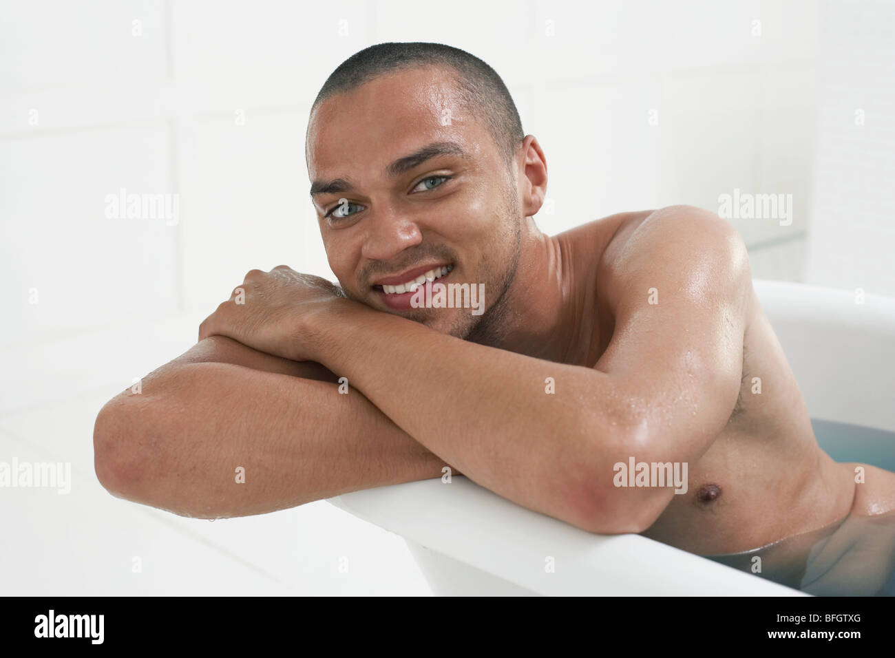 Man Taking a Bath Stock Photo - Alamy