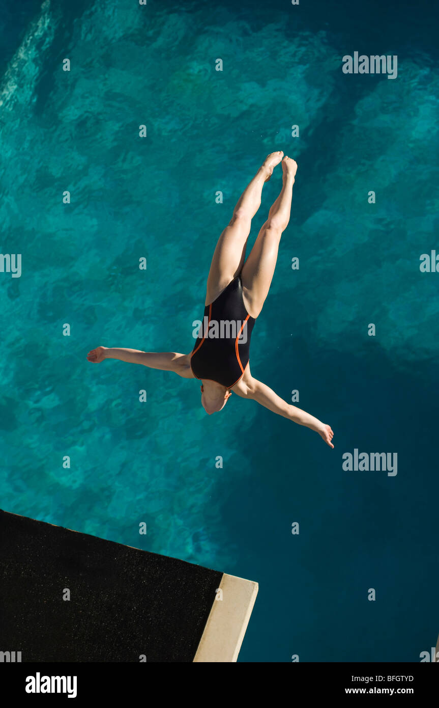 Young woman diving into swimming pool Stock Photo - Alamy Young woman diving into swimming pool Stock Photo - Alamy