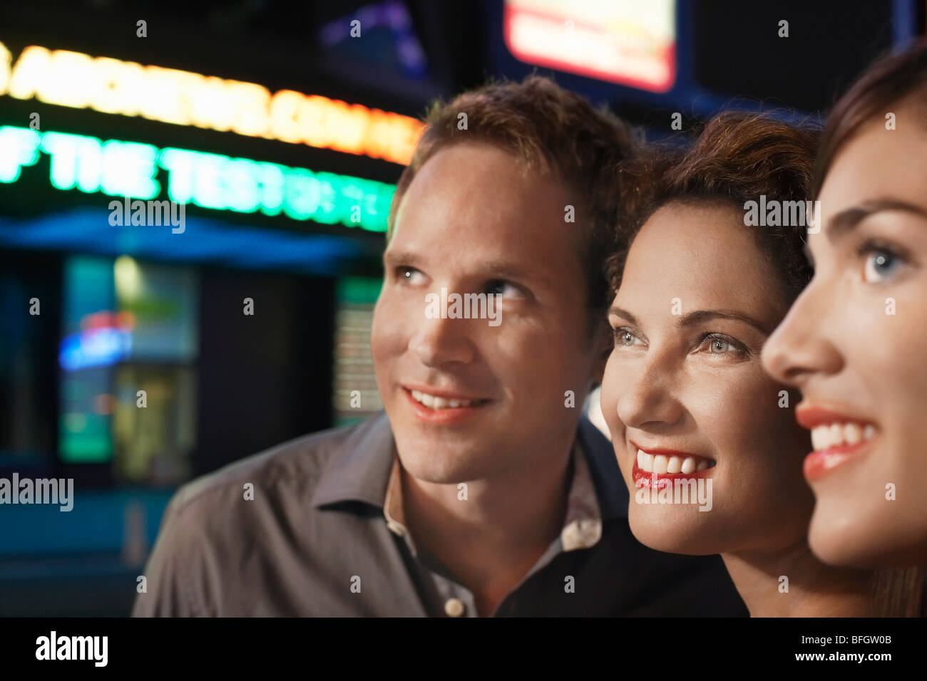 People Waiting in Line at Theatre, at night Stock Photo - Alamy